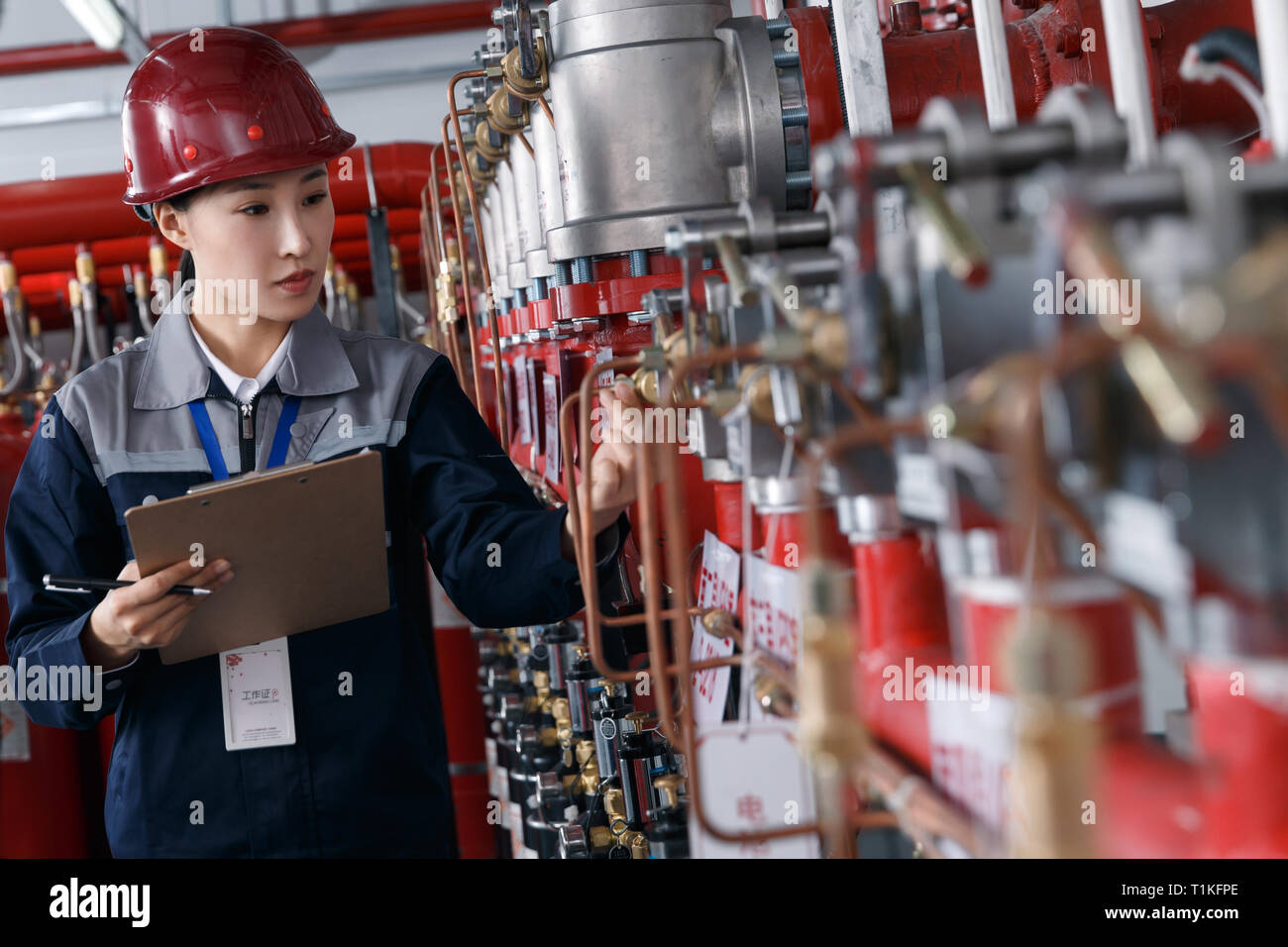 Technical personnel in the factory fire control room inspection Stock ...