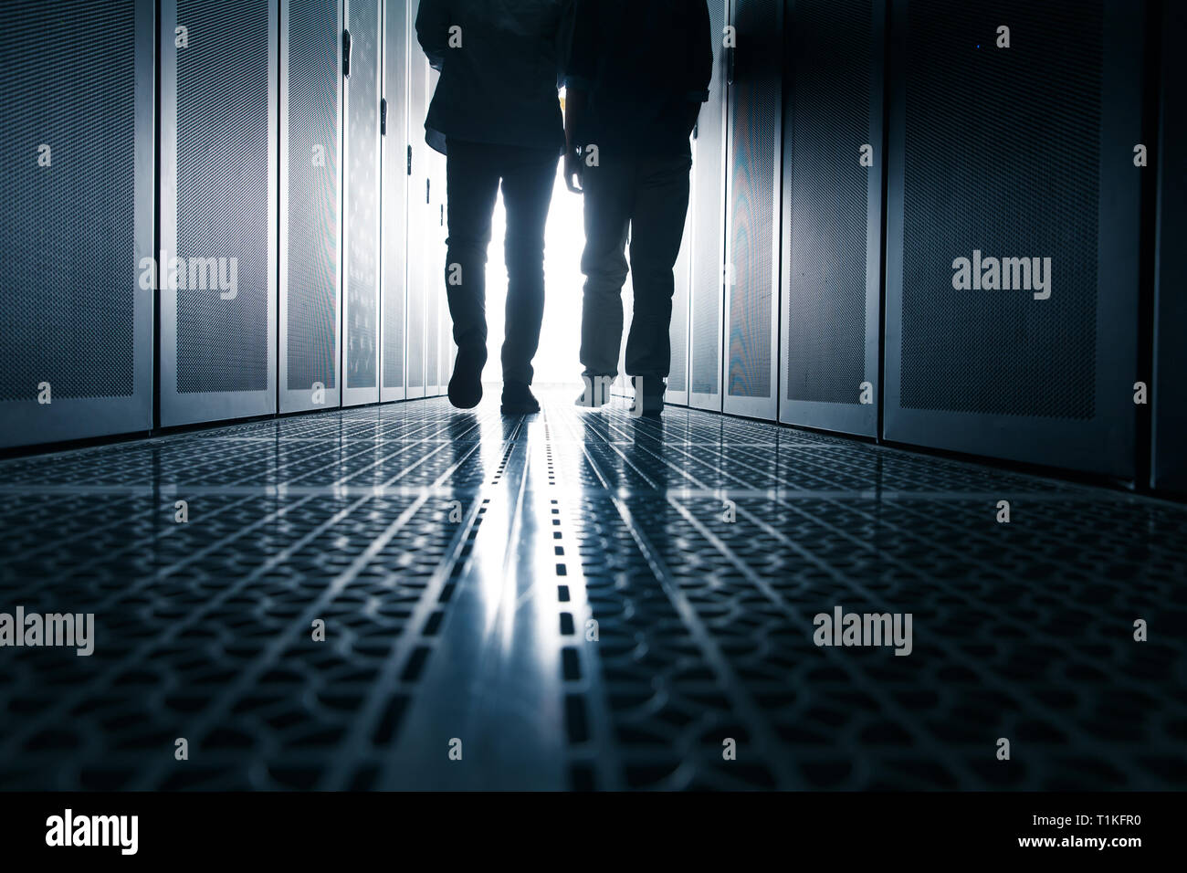 Technical personnel in machine room inspection Stock Photo - Alamy