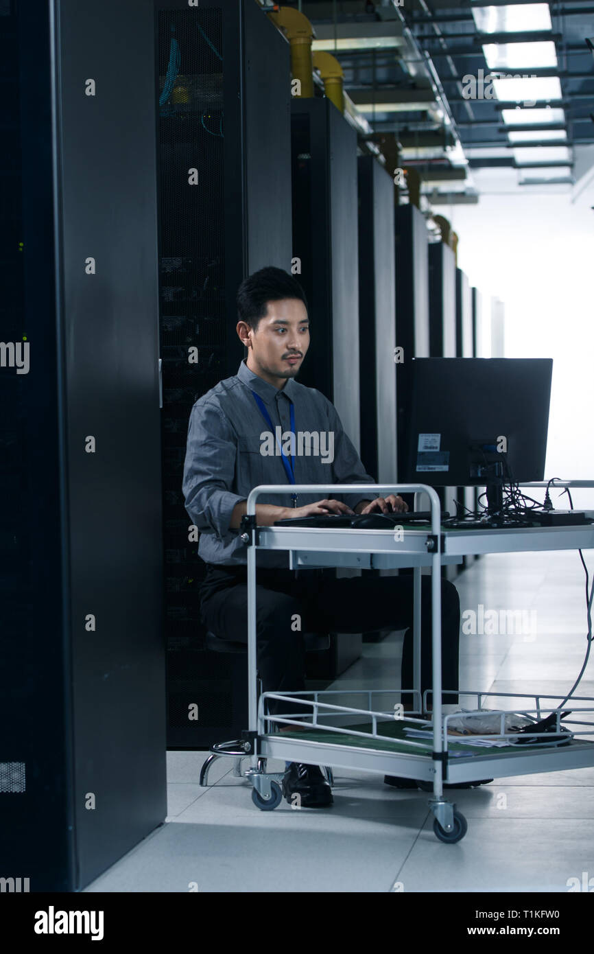 Technical personnel in the maintenance room inspection Stock Photo - Alamy