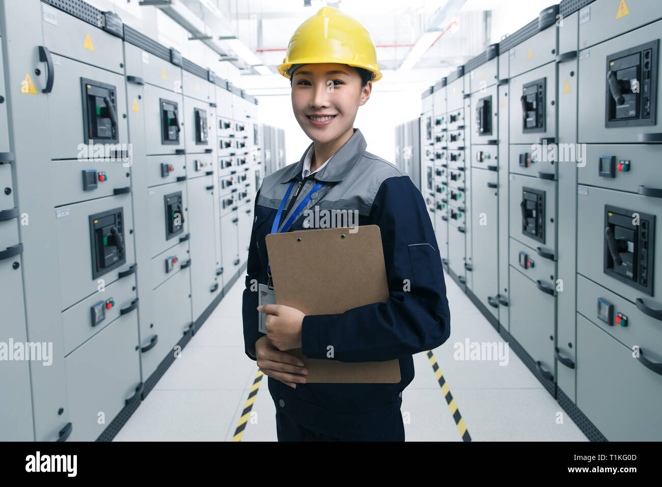Technicians work in a factory Stock Photo - Alamy