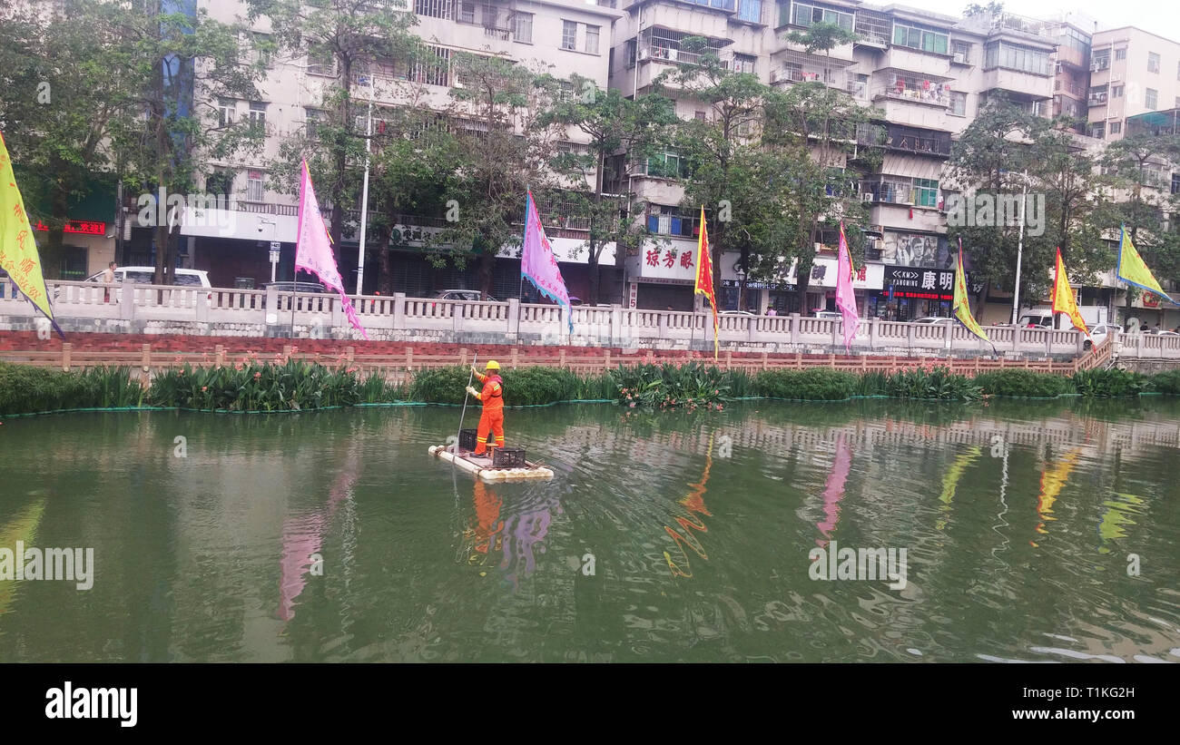 Shenzhen, China: Workers clean up rubbish on the Xixiang River Stock ...