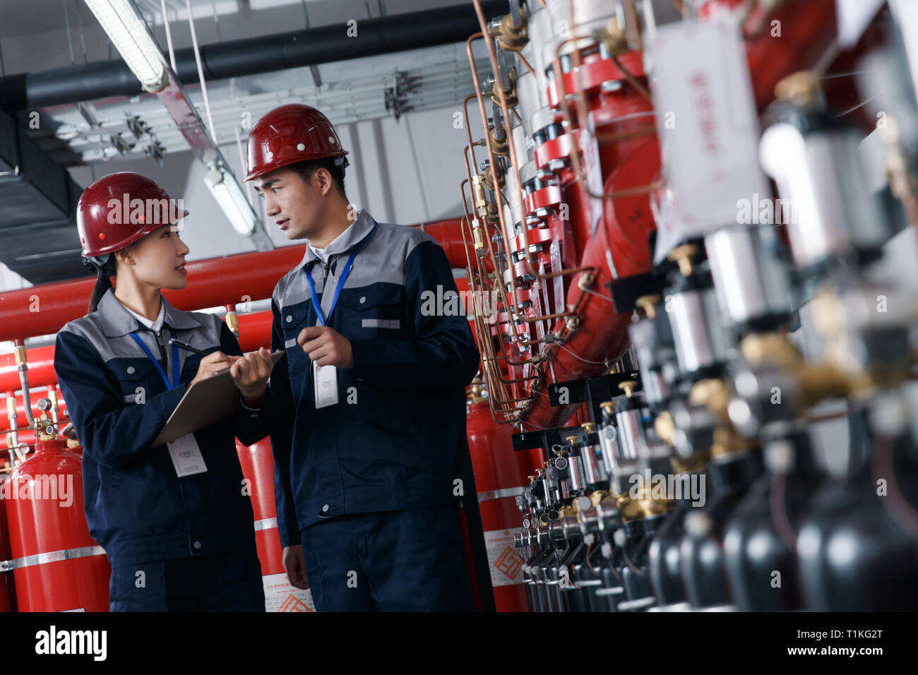 Technical personnel in the factory fire control room inspection Stock ...