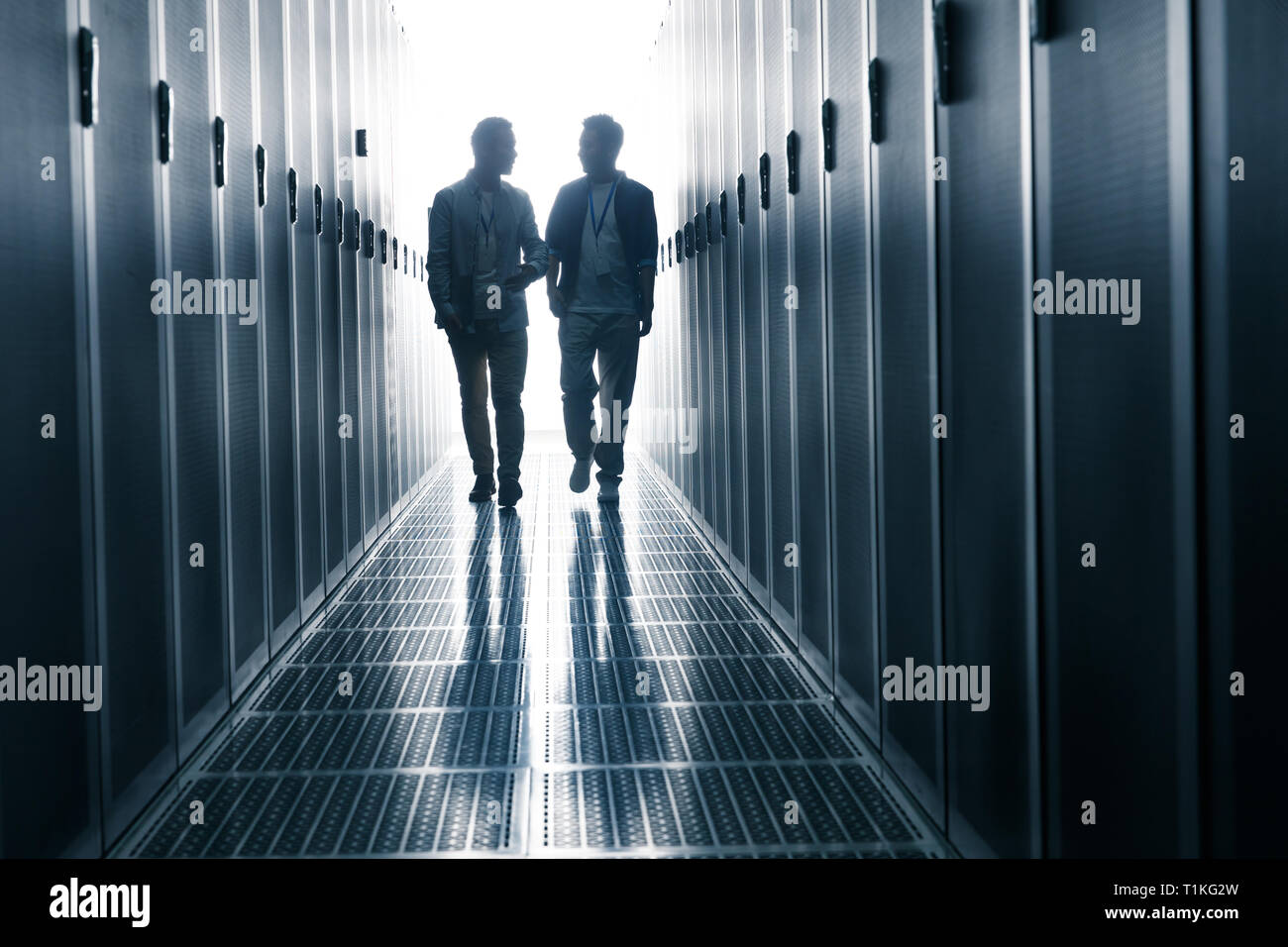 Technical personnel in machine room inspection Stock Photo - Alamy