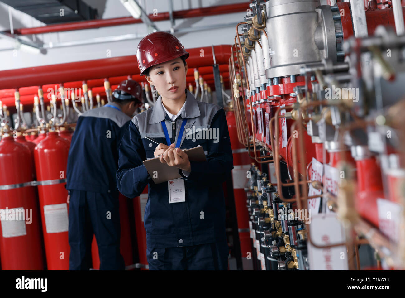 Technical personnel in the factory fire control room inspection Stock ...