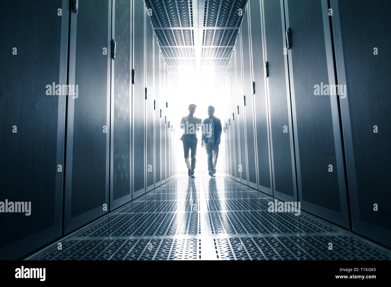 Technical personnel in machine room inspection Stock Photo - Alamy
