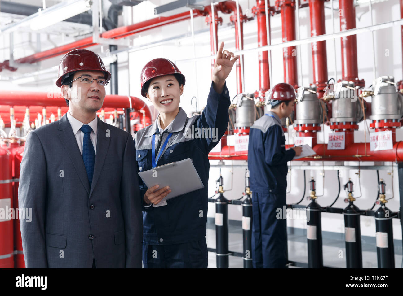 Technical personnel in the factory fire control room inspection Stock ...