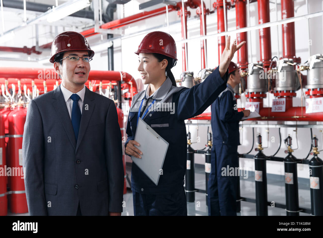Technical personnel in the factory fire control room inspection Stock ...