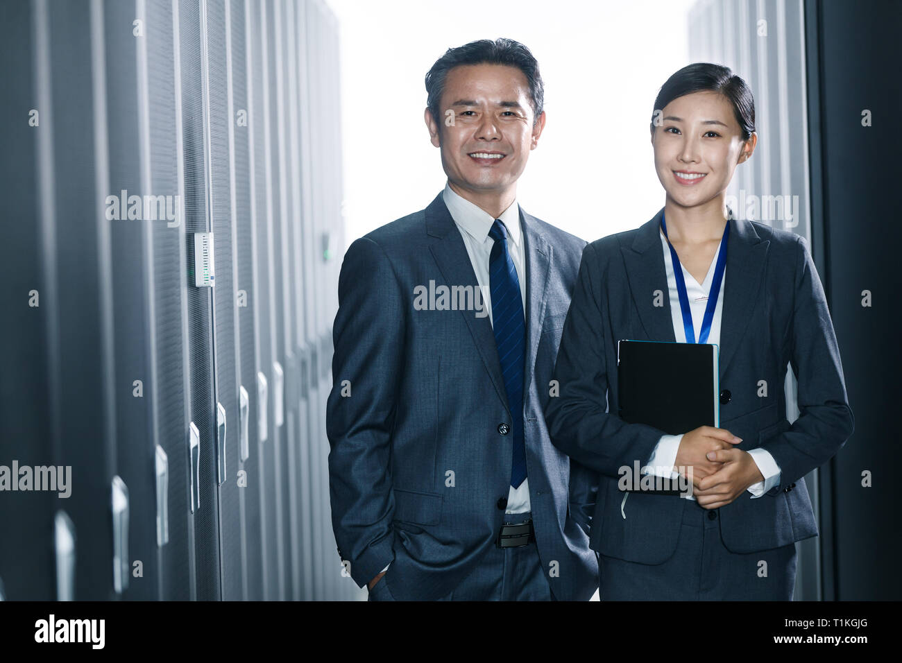 Technical personnel in machine room inspection Stock Photo - Alamy