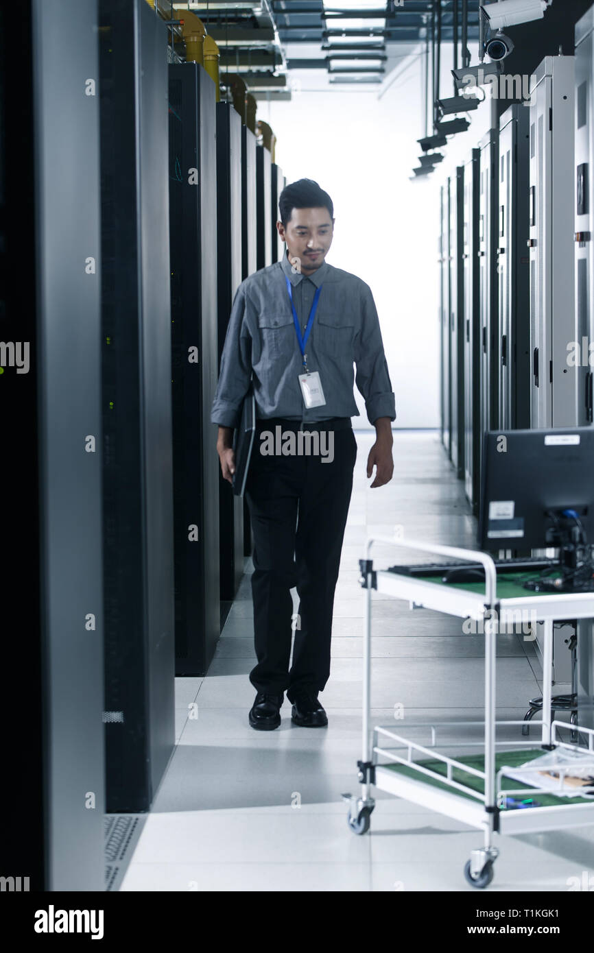 Technical personnel in the maintenance room inspection Stock Photo - Alamy