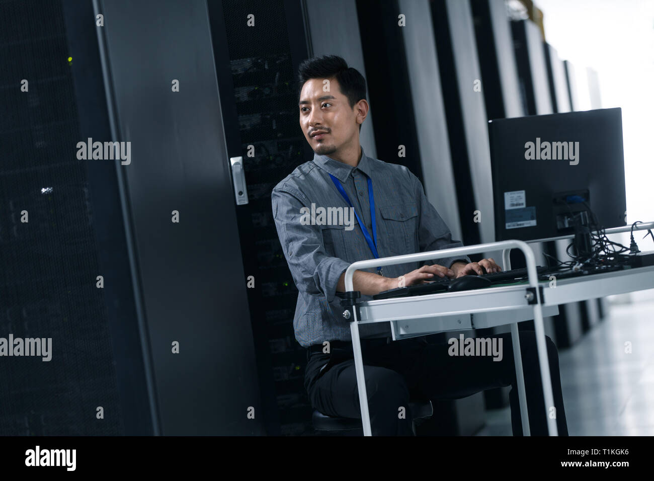 Technical personnel in the maintenance room inspection Stock Photo - Alamy