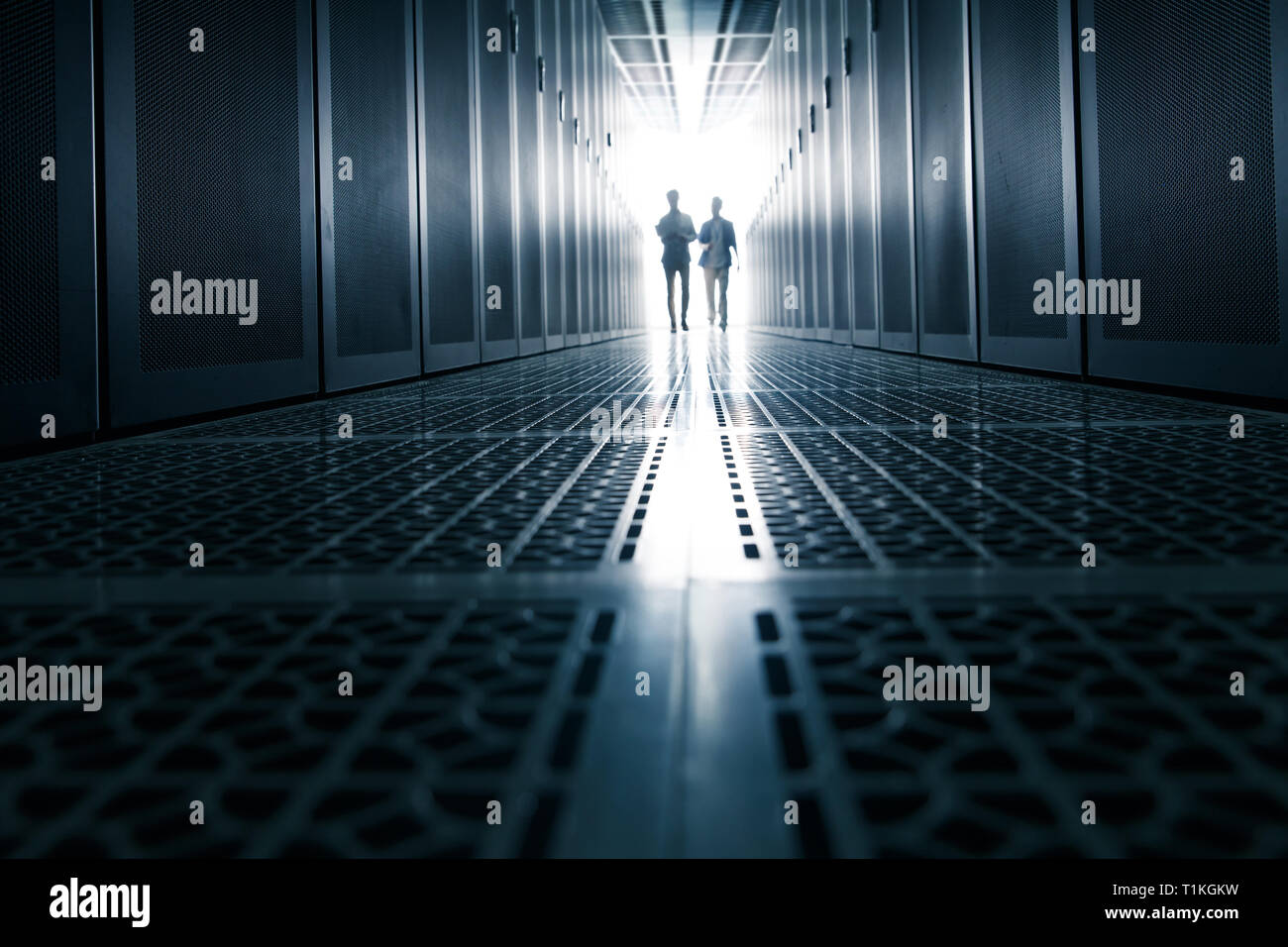 Technical personnel in machine room inspection Stock Photo - Alamy