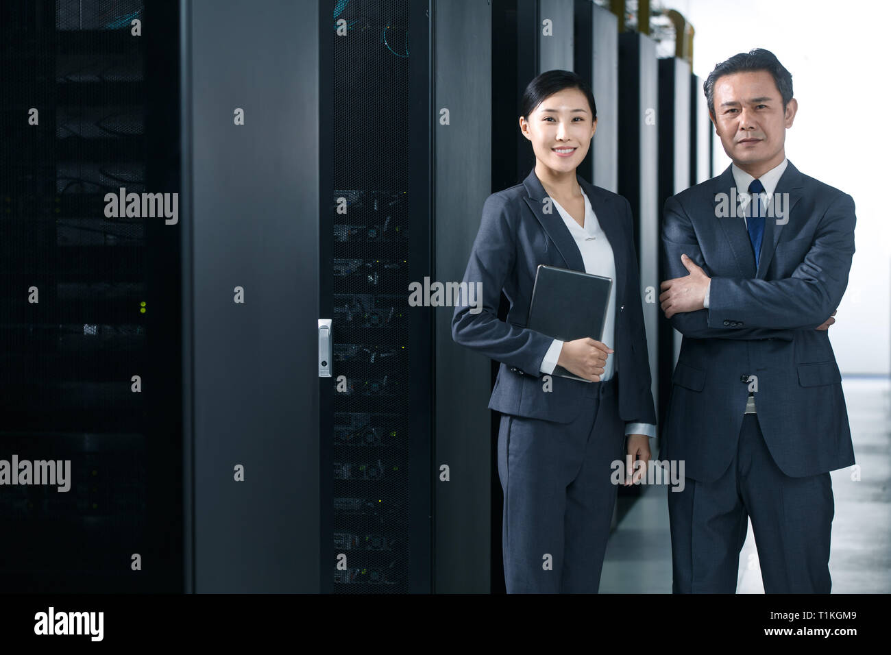 Technical personnel in machine room inspection Stock Photo - Alamy