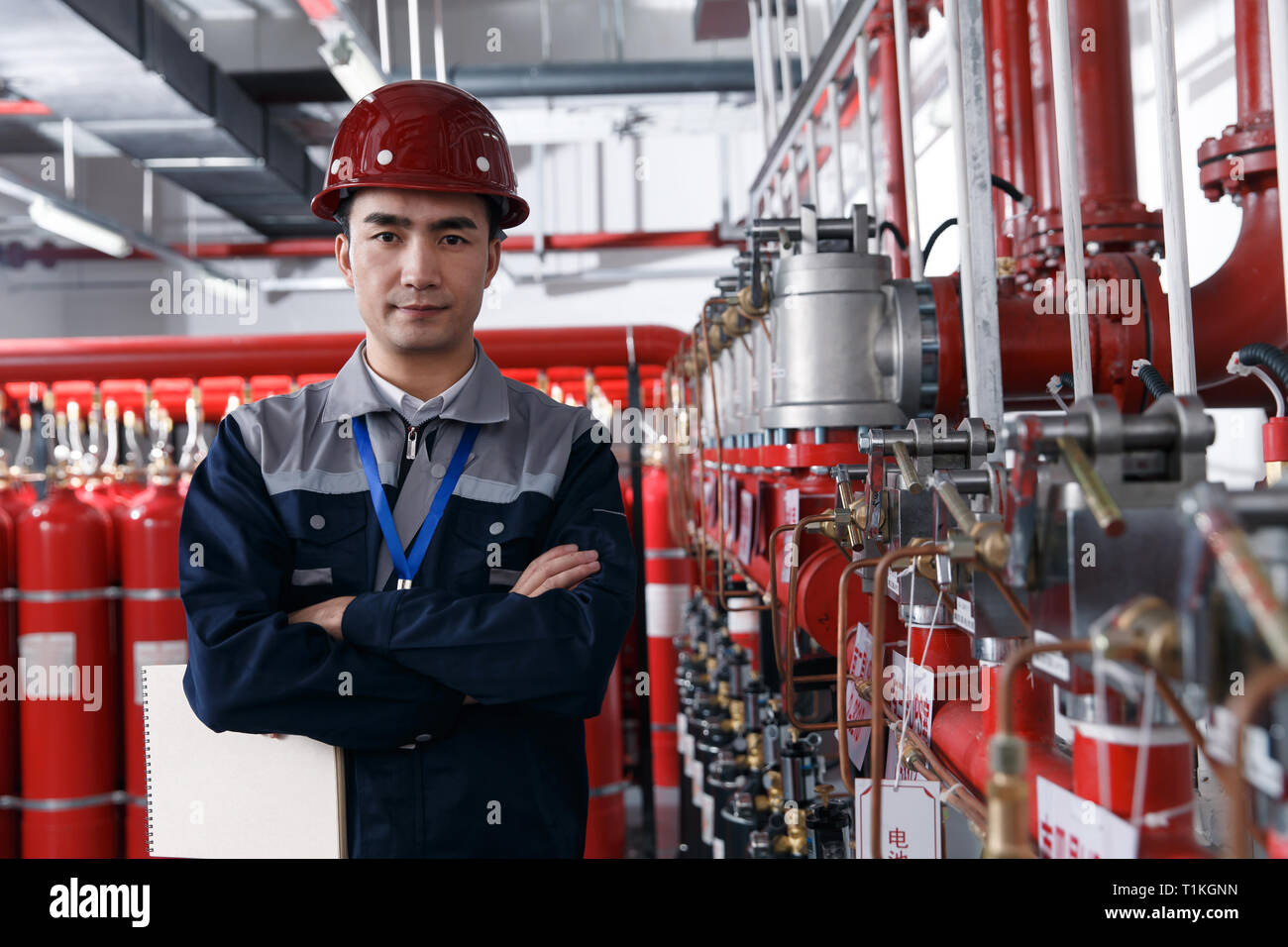 Technical personnel in the factory fire control room inspection Stock ...