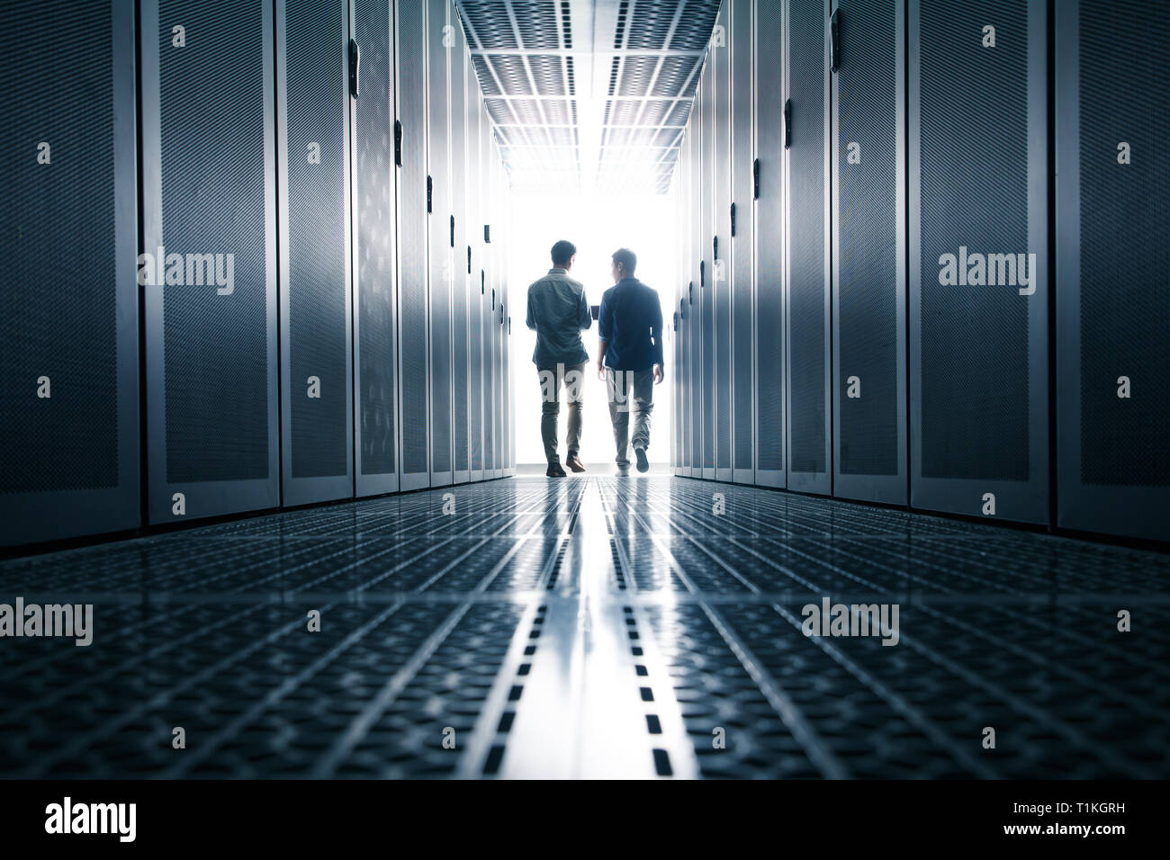 Technical personnel in machine room inspection Stock Photo - Alamy