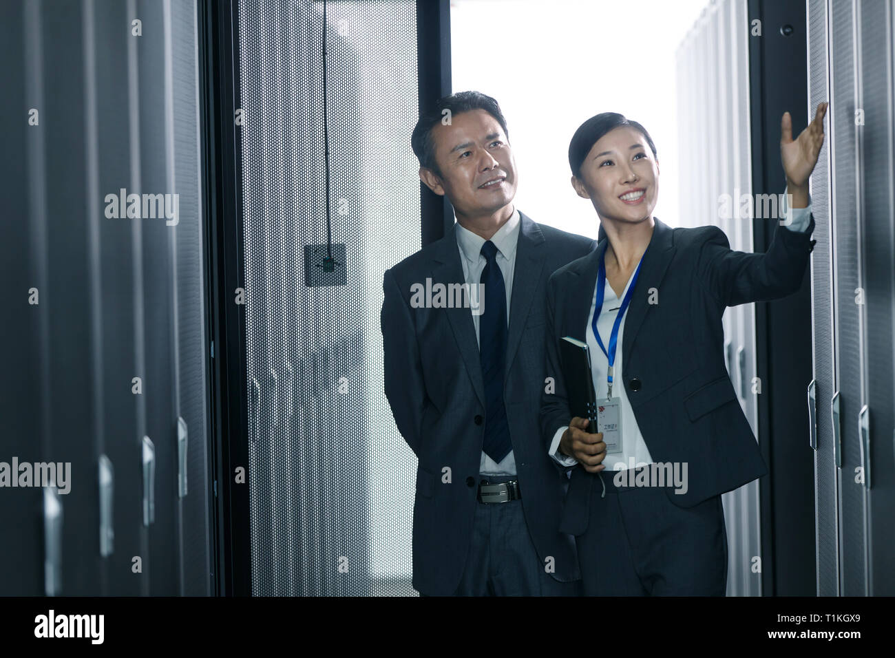 Technical personnel in machine room inspection Stock Photo - Alamy