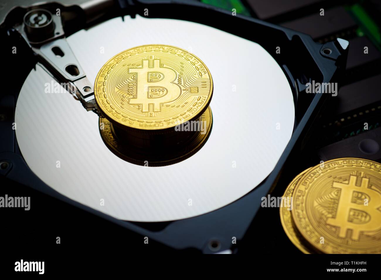 Bitcoins on a hard drive Stock Photo - Alamy