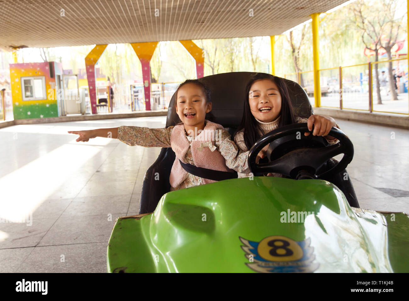 Elementary school students play in the playground Stock Photo - Alamy
