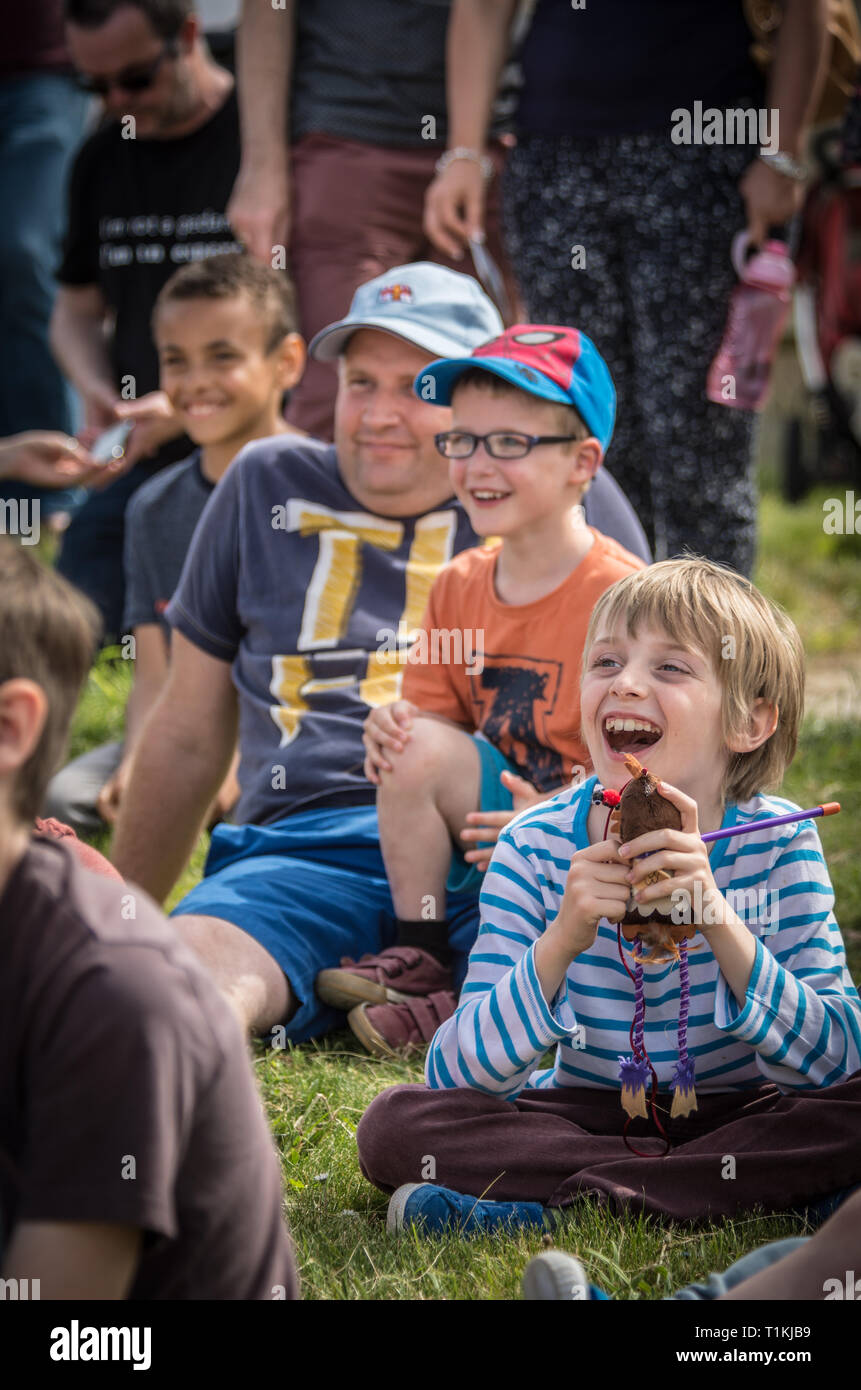 Young children watching a performance hi-res stock photography and ...