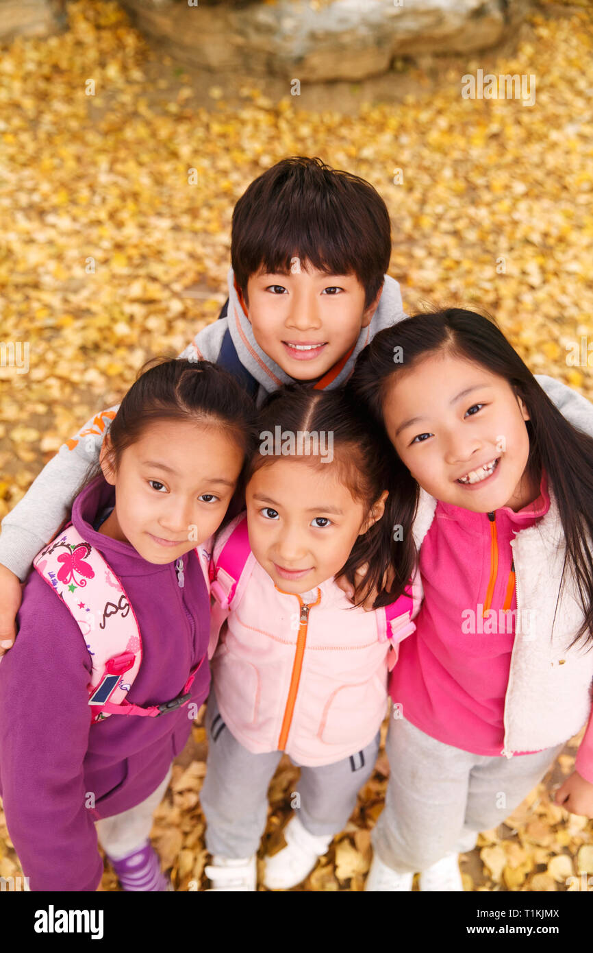 Pupils play outdoors Stock Photo - Alamy