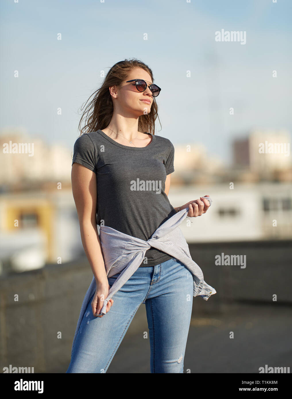 Shallow DOF portrait of a beautiful woman in urban environment Stock ...