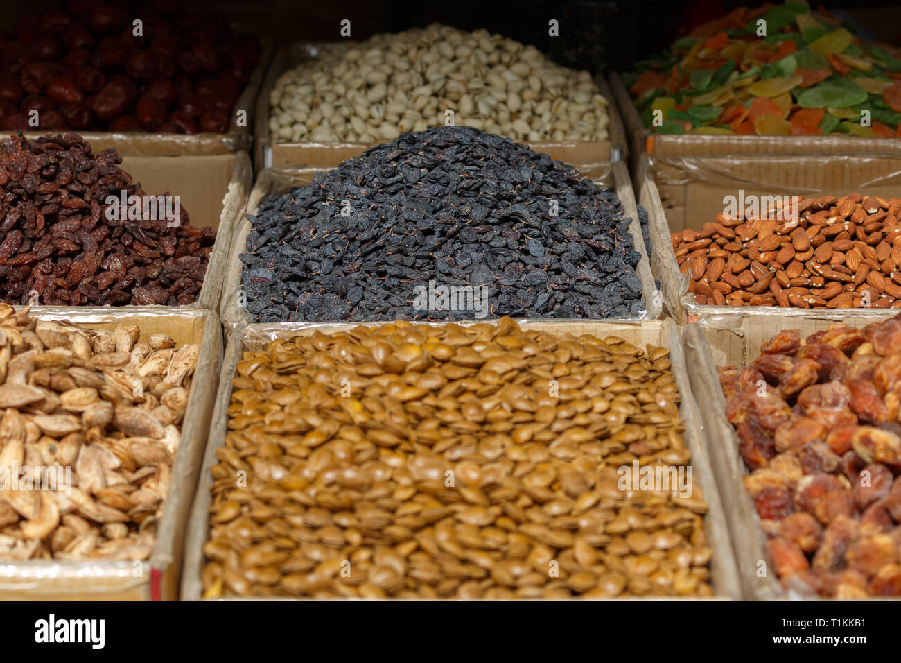 Black raisins on display for sale at a bazaar in Kashgar. (Xinjiang ...