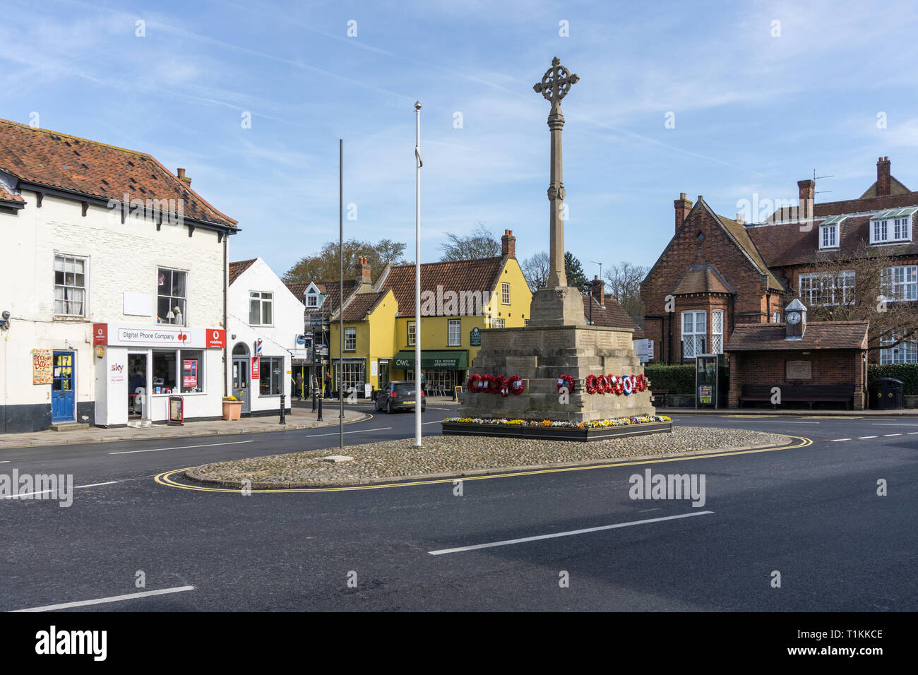 Market place and war memorial in the market town of Holt, Norfolk, UK ...
