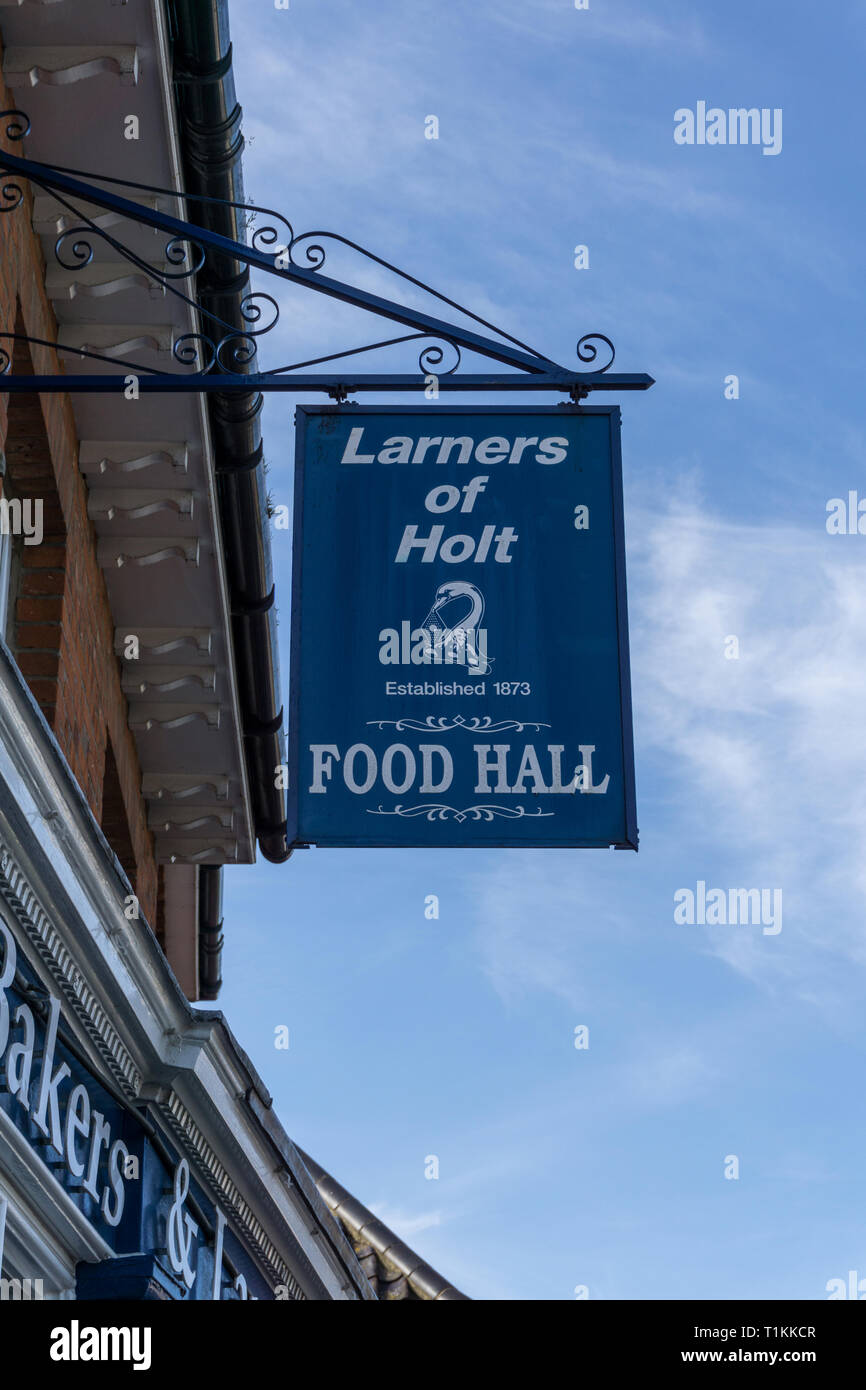Blue hanging sign for the food hall at Larners, an upmarket retailer in ...