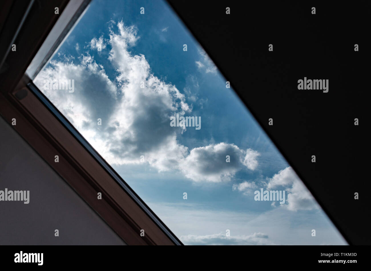 Attic. View from the window. View of the sky from the window. Skylight ...