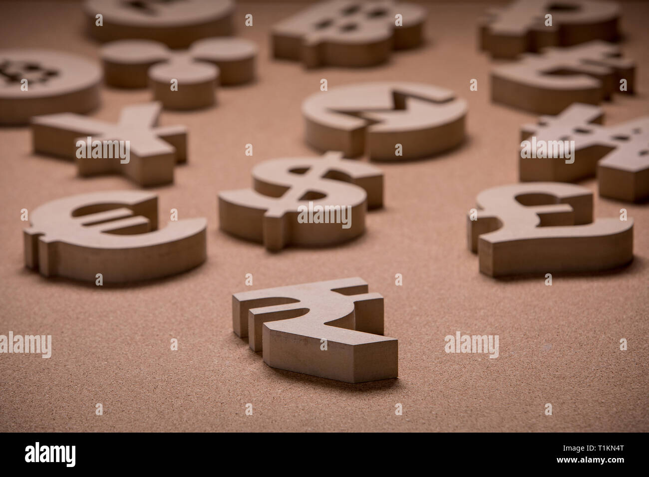 Wooden Symbols of World Currencies in Group Picture with Shallow Focus ...