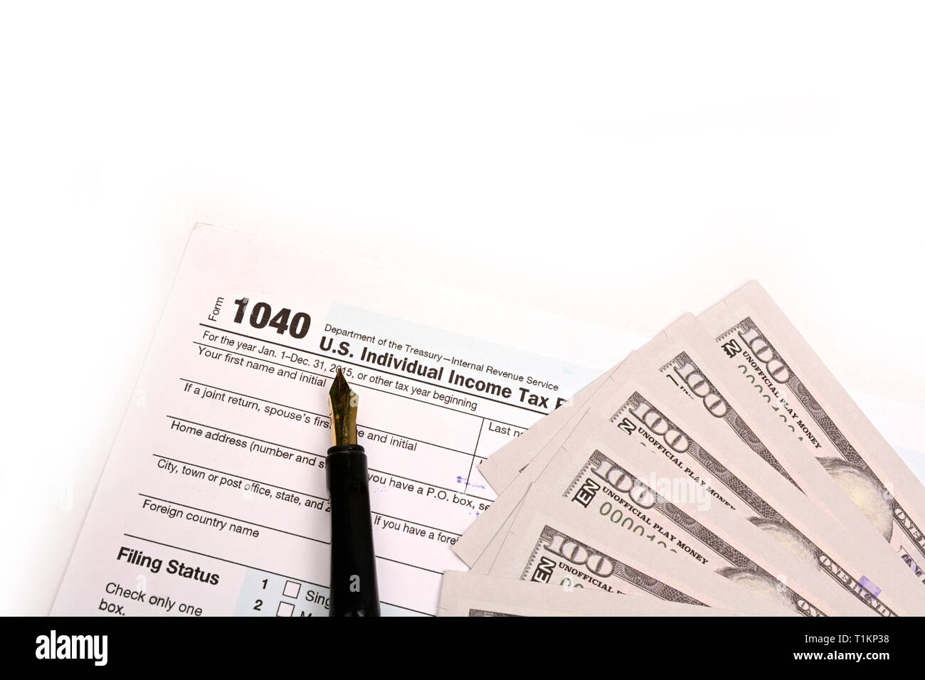Completing US tax return form 1040 on white background Stock Photo - Alamy