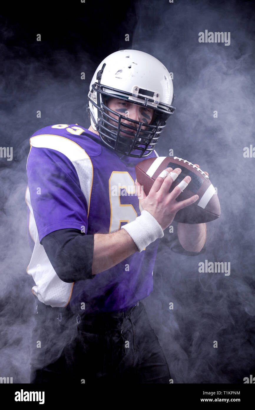 American Footballer running fast Stock Photo - Alamy