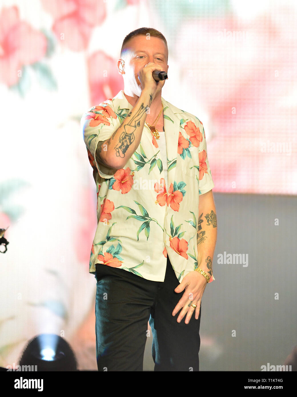 Macklemore performs on stage at Universal Studio Florida on February 23 ...