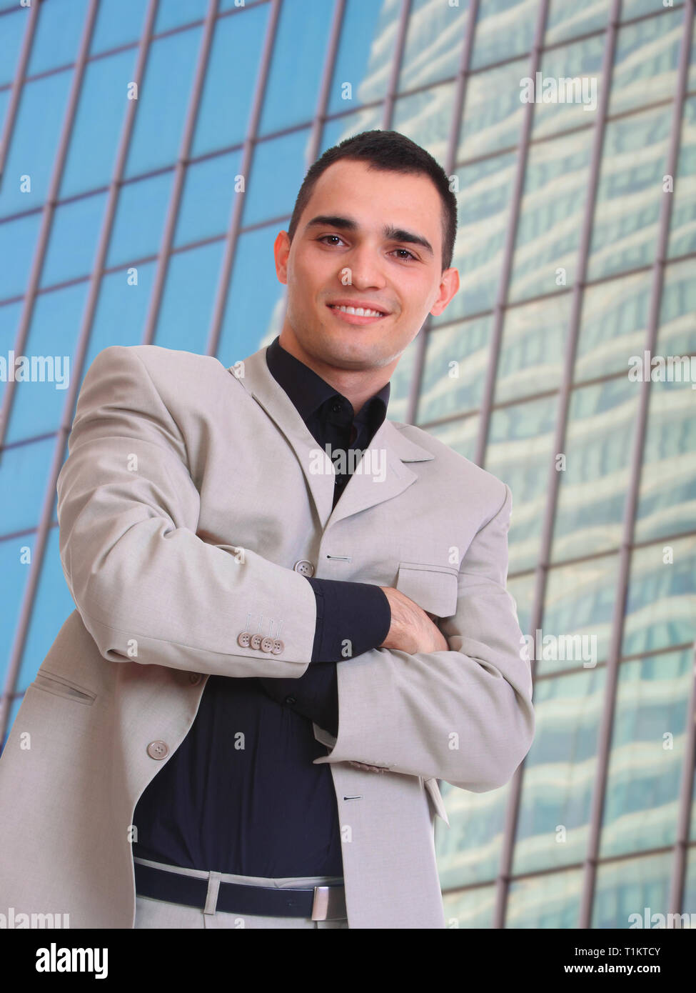 Business man at the office building Stock Photo - Alamy