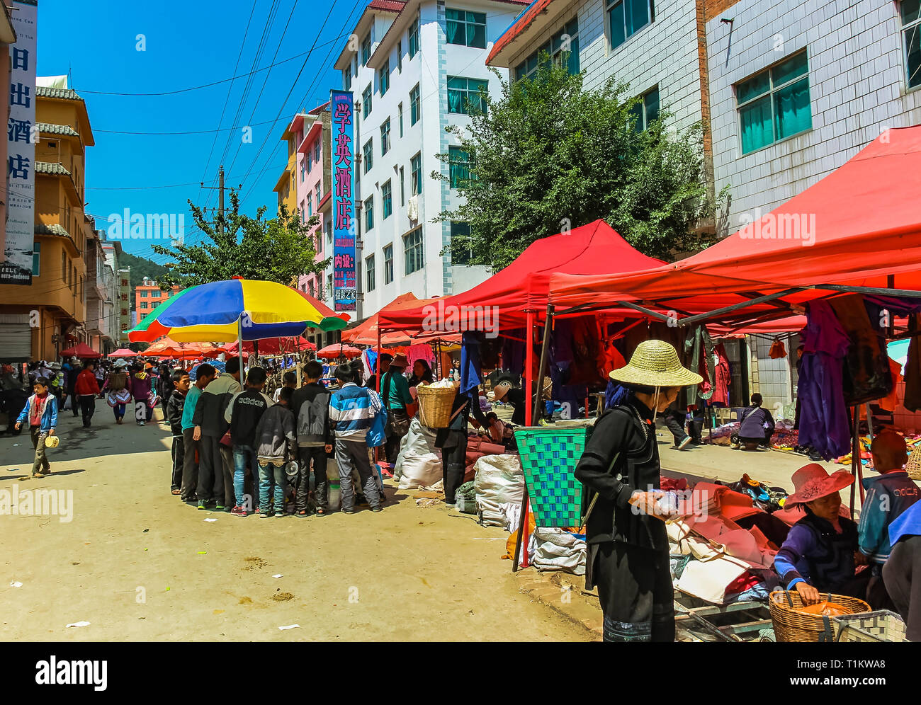 Yuanyang County, Yunnan, China - 2014: Street market with Hani minority ...