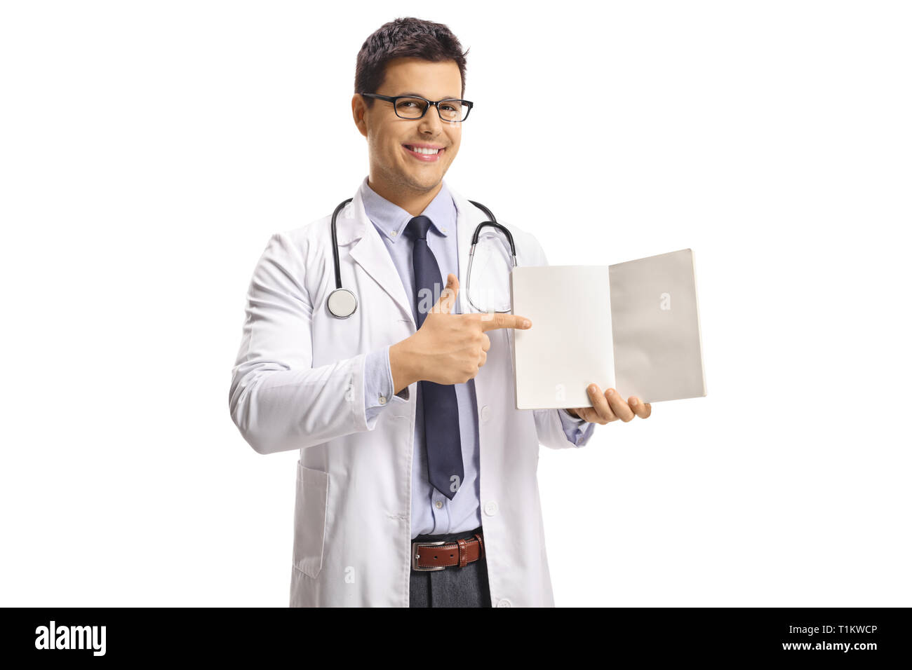 Young smiling male doctor holding a blank notebook isolated on white ...