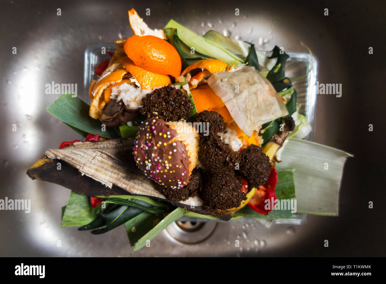 Kitchen food waste collected and destined for the organic recycling bin ...