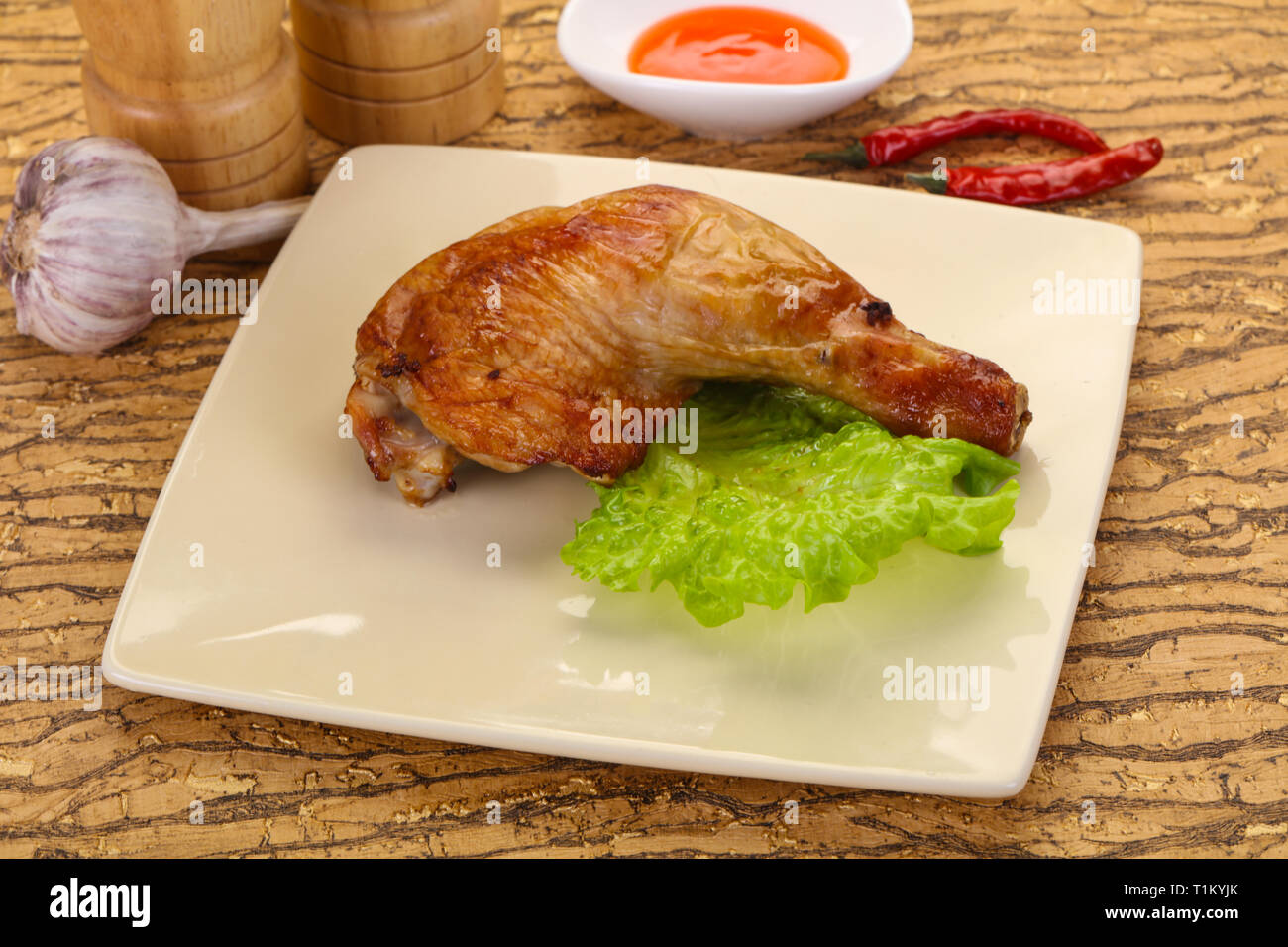 Crispy tasty Roasted chicken leg Stock Photo - Alamy