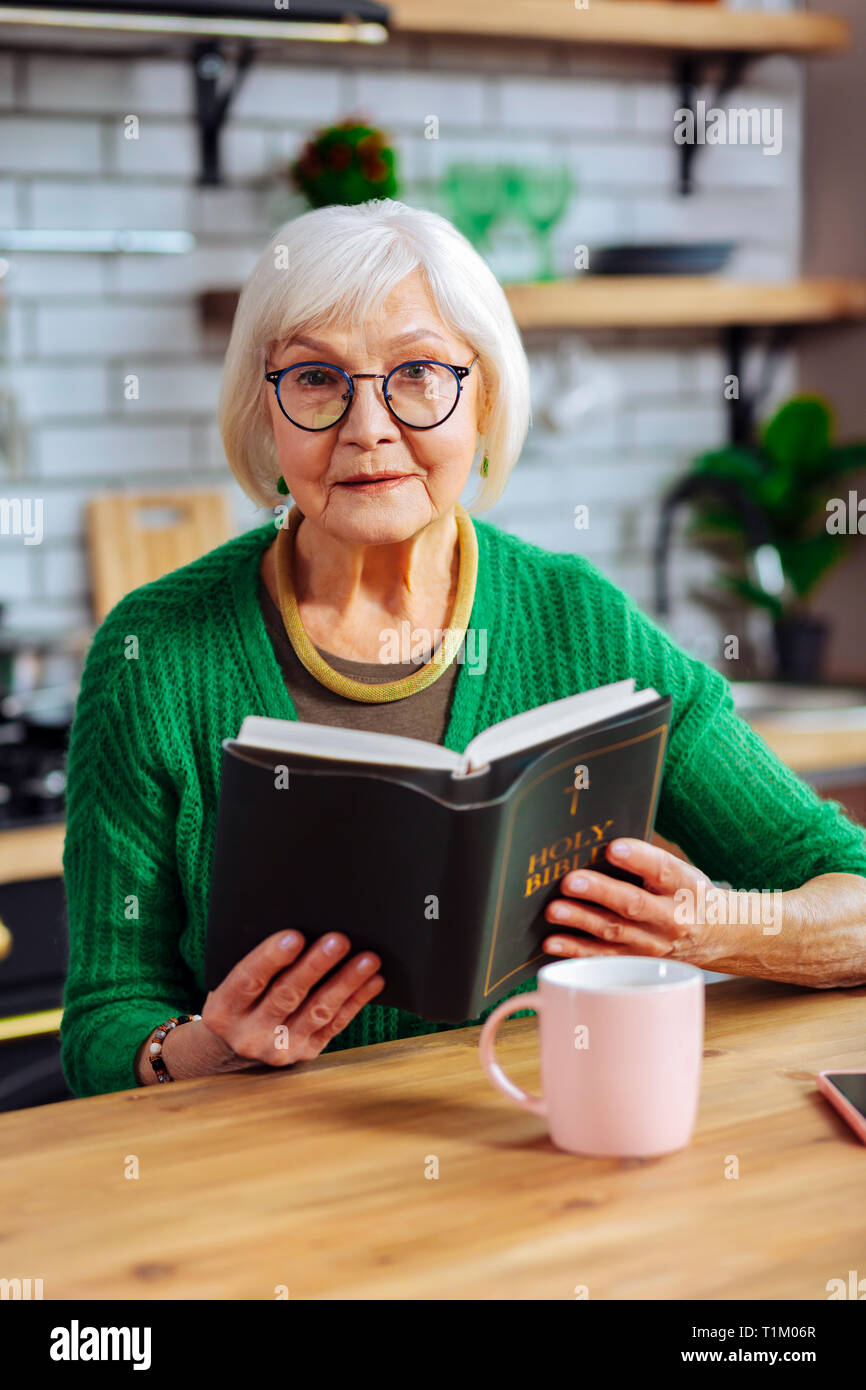 Portrait woman reading bible hi-res stock photography and images - Alamy