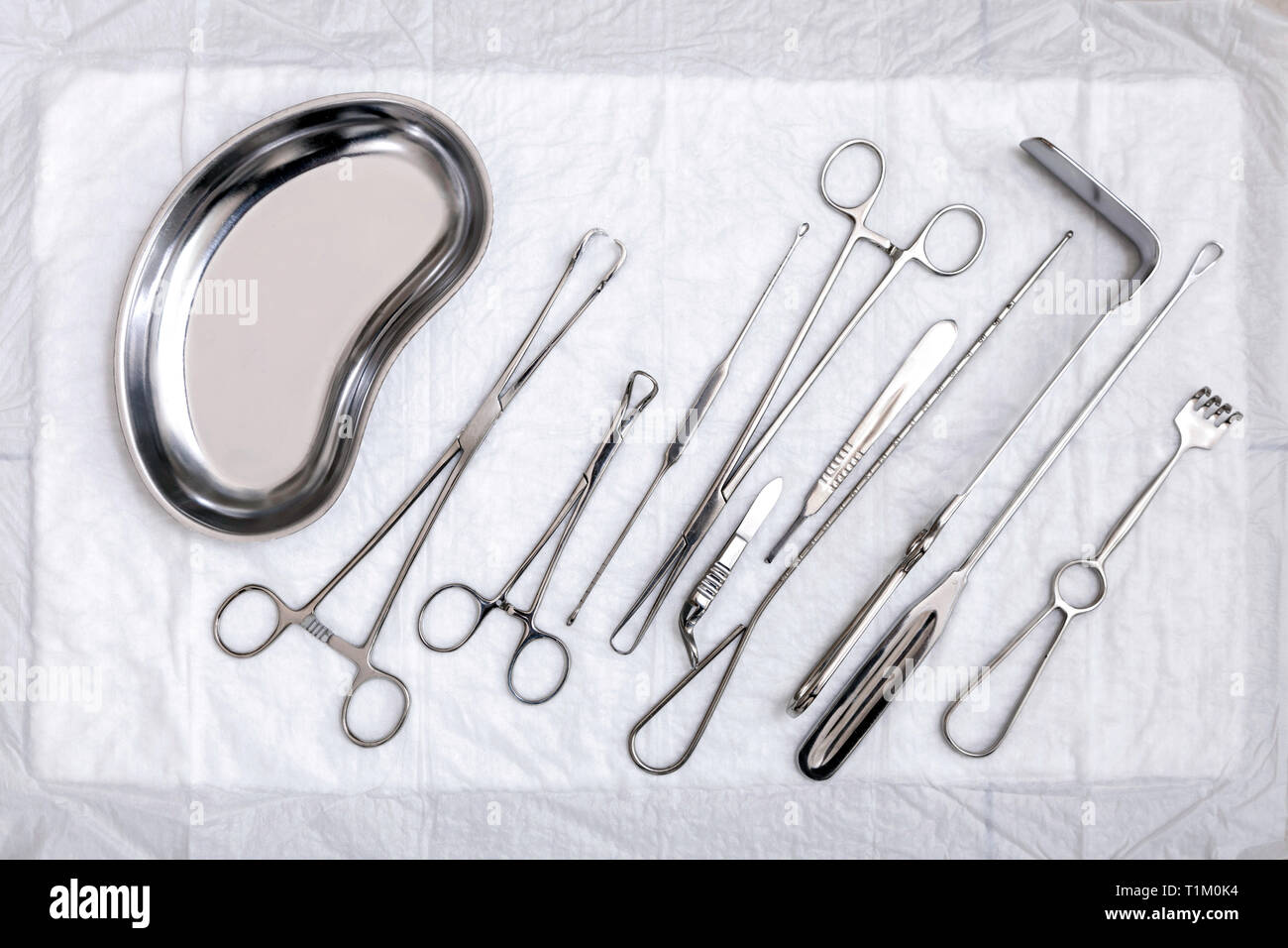 Gynecological sterile tools. A lot of instruments of gynecologist on ...