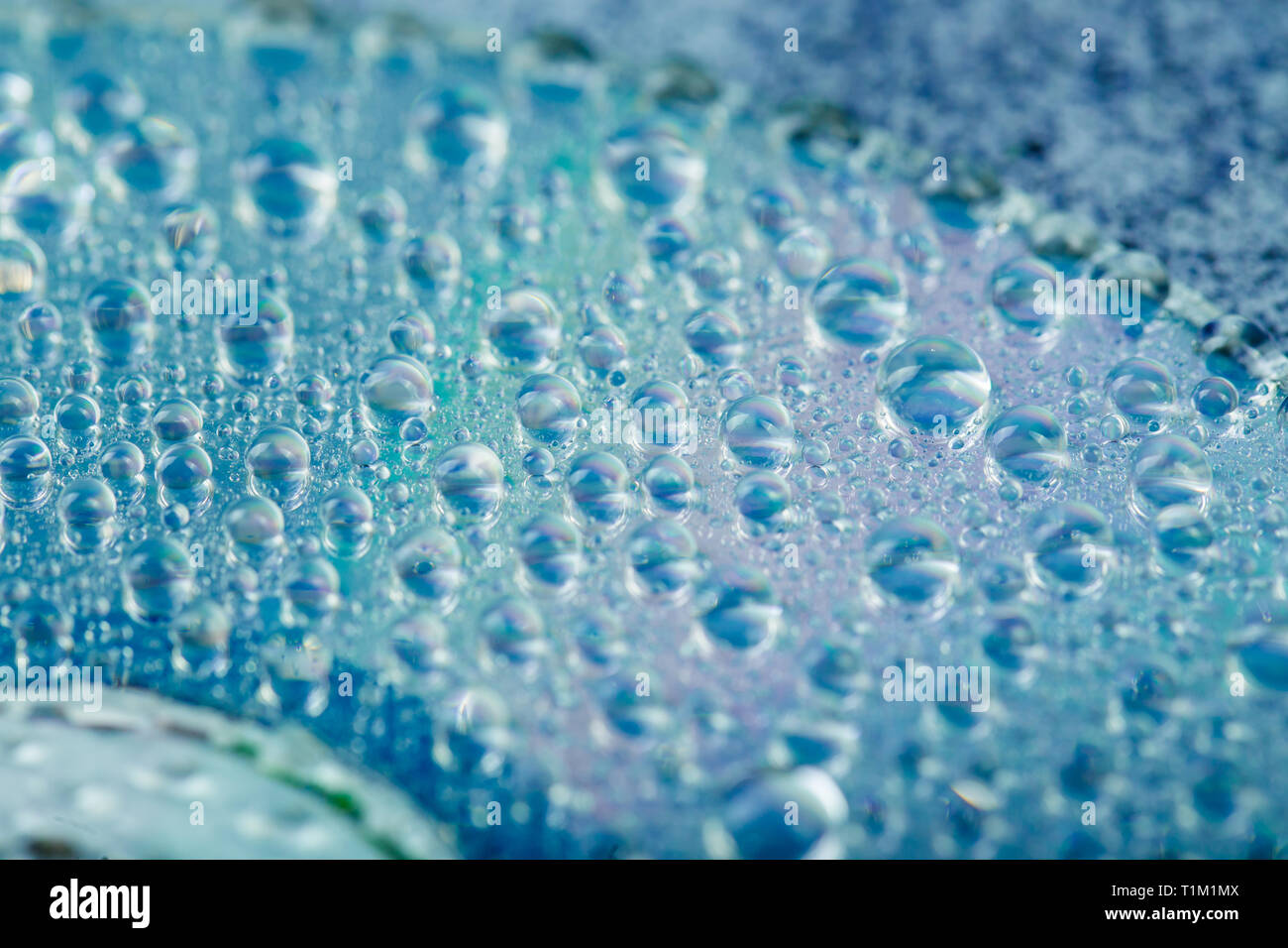 Water drops ripples blue close up hi-res stock photography and images ...