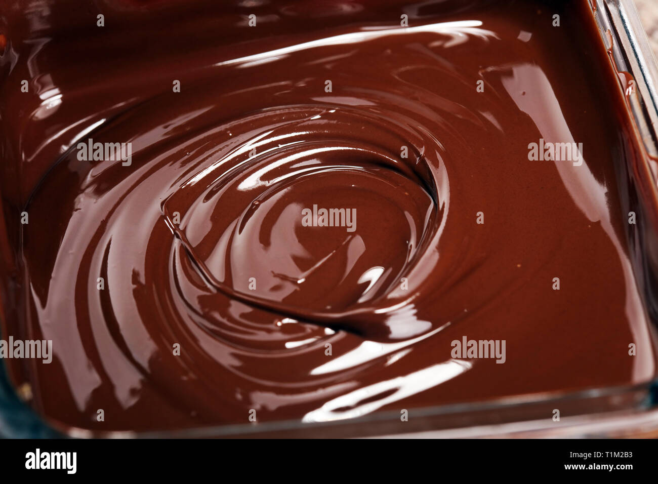 Melting chocolate, melted delicious chocolate for praline icing ...