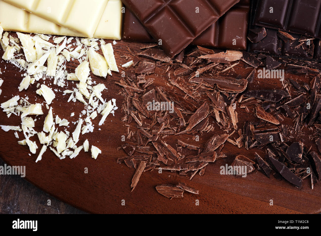chocolate in diffrent color. milk, dark and white chocolate bars and ...