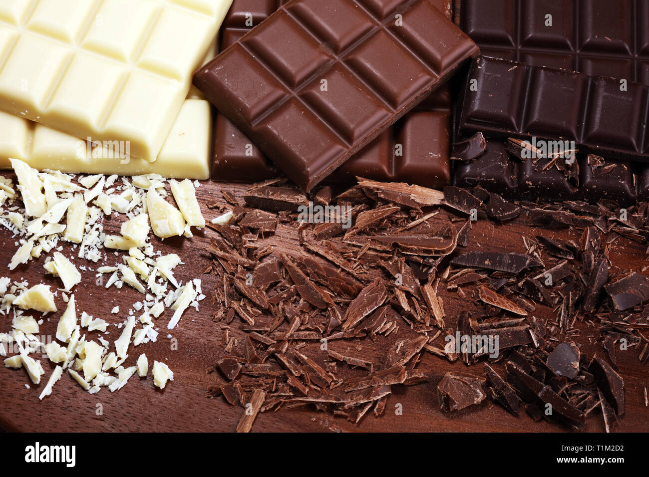 chocolate in diffrent color. milk, dark and white chocolate bars and ...