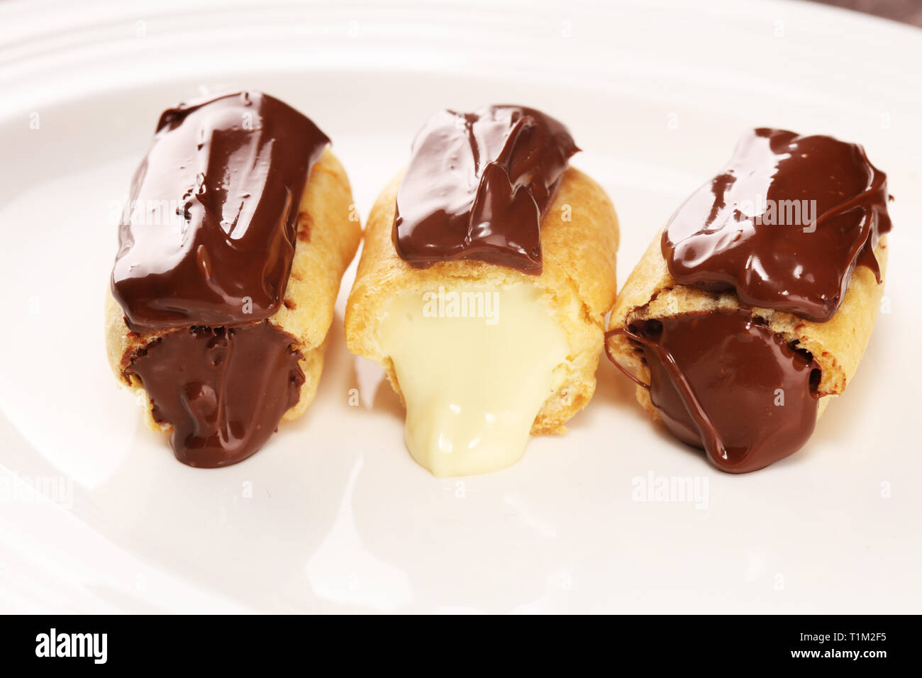 Traditional french chocolate eclair hi-res stock photography and images ...