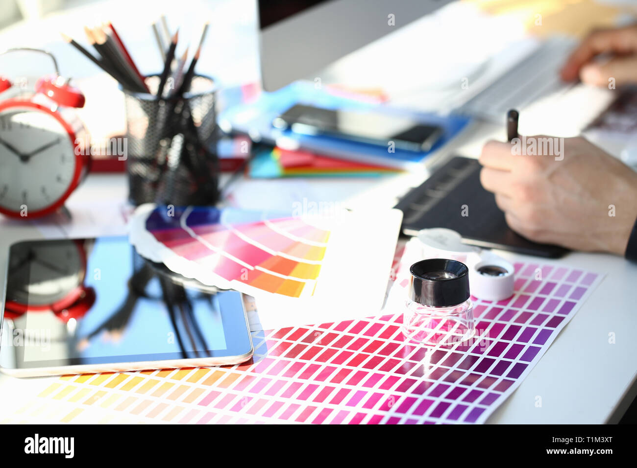 Test print paper page with colour test design fantail and magnifying ...