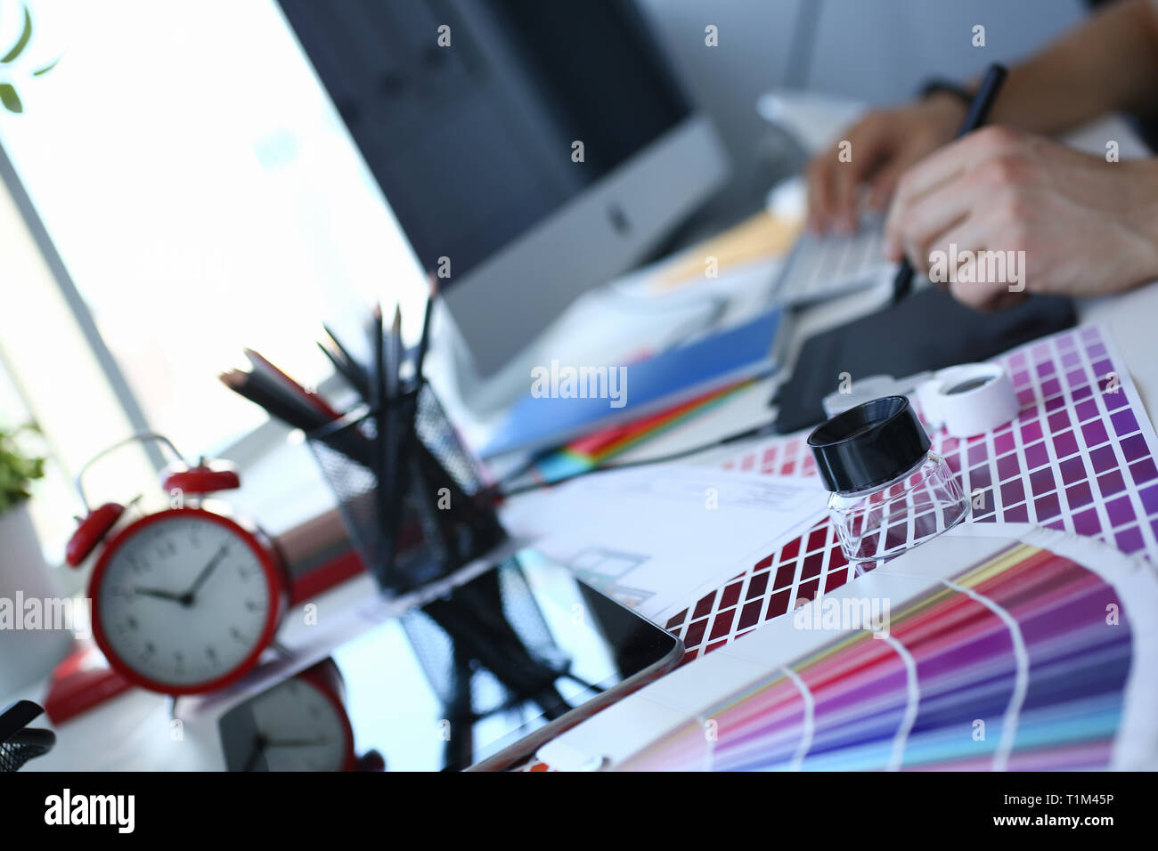 Test print paper page with colour test design fantail and magnifying ...