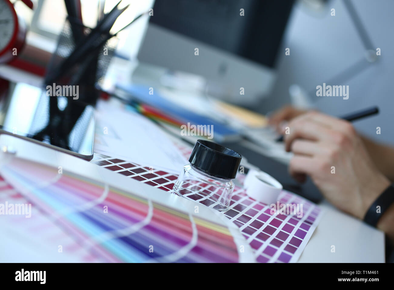 Test print paper page with colour test design fantail and magnifying ...