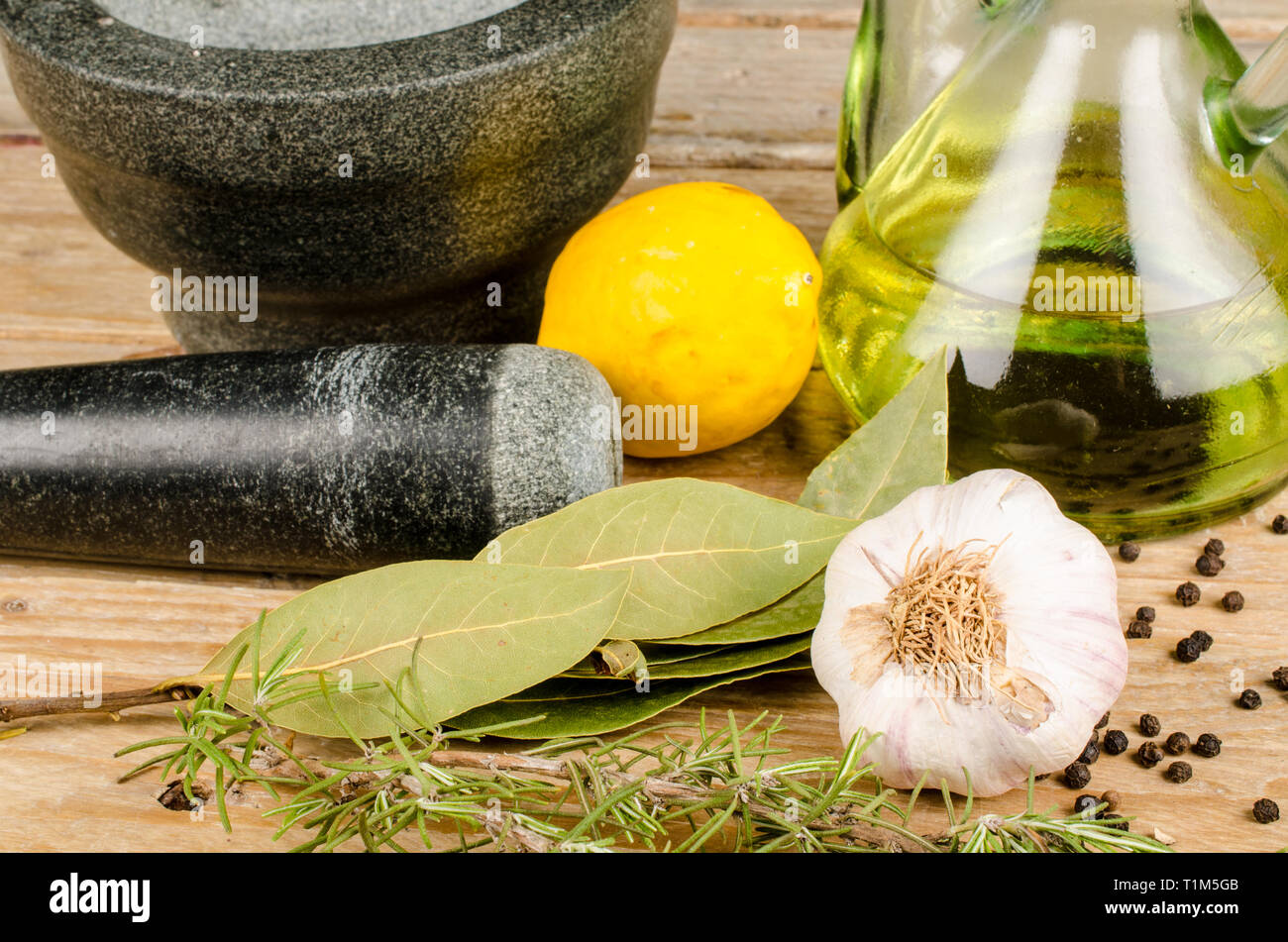 Mortar and pestle amid fresh and healthy Mediterranean ingredients ...