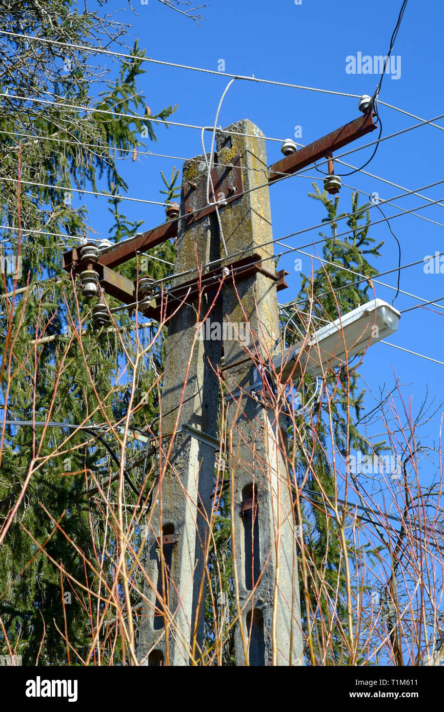 electrical wires and street lamp on concrete post in rural village zala ...
