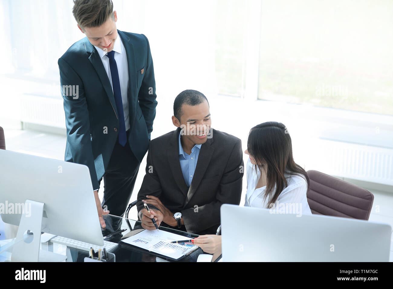 employees working with financial documents in the office Stock Photo ...